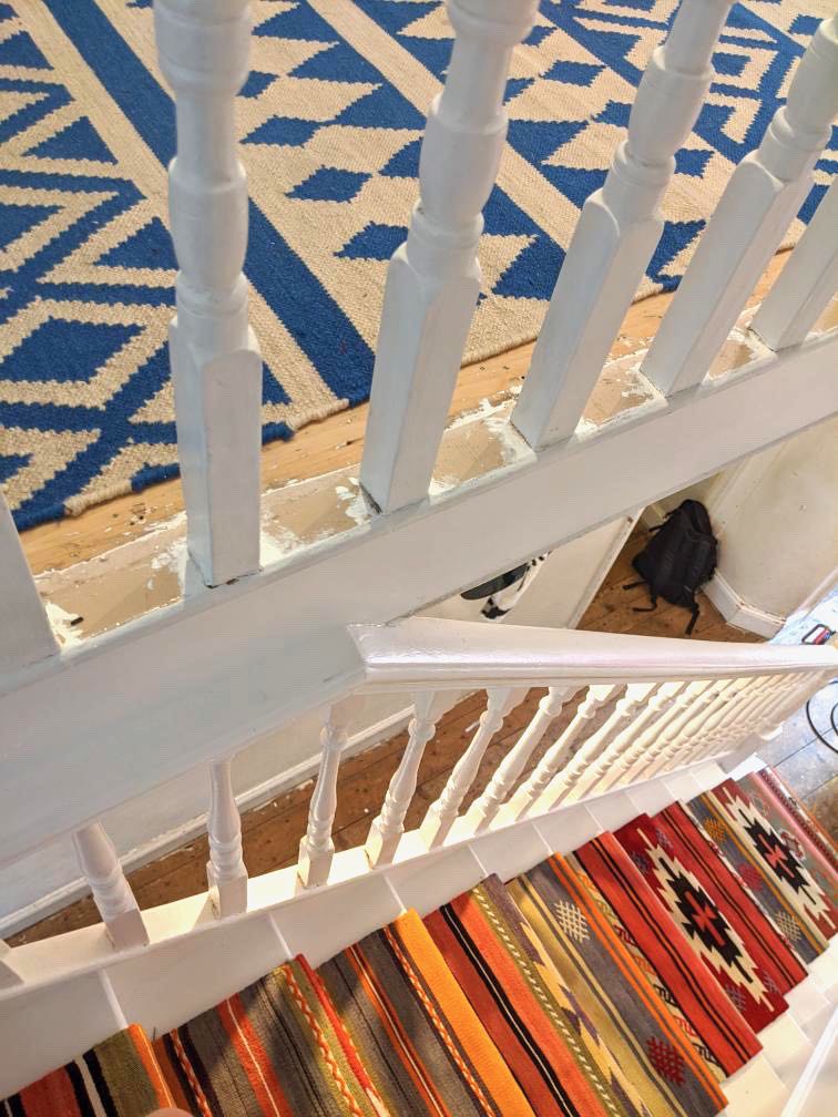Vintage Kilim Runners Fitted To Stairs In Hallway