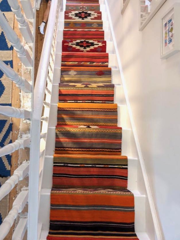 Vintage Kilim Runners Fitted To Stairs In Hallway